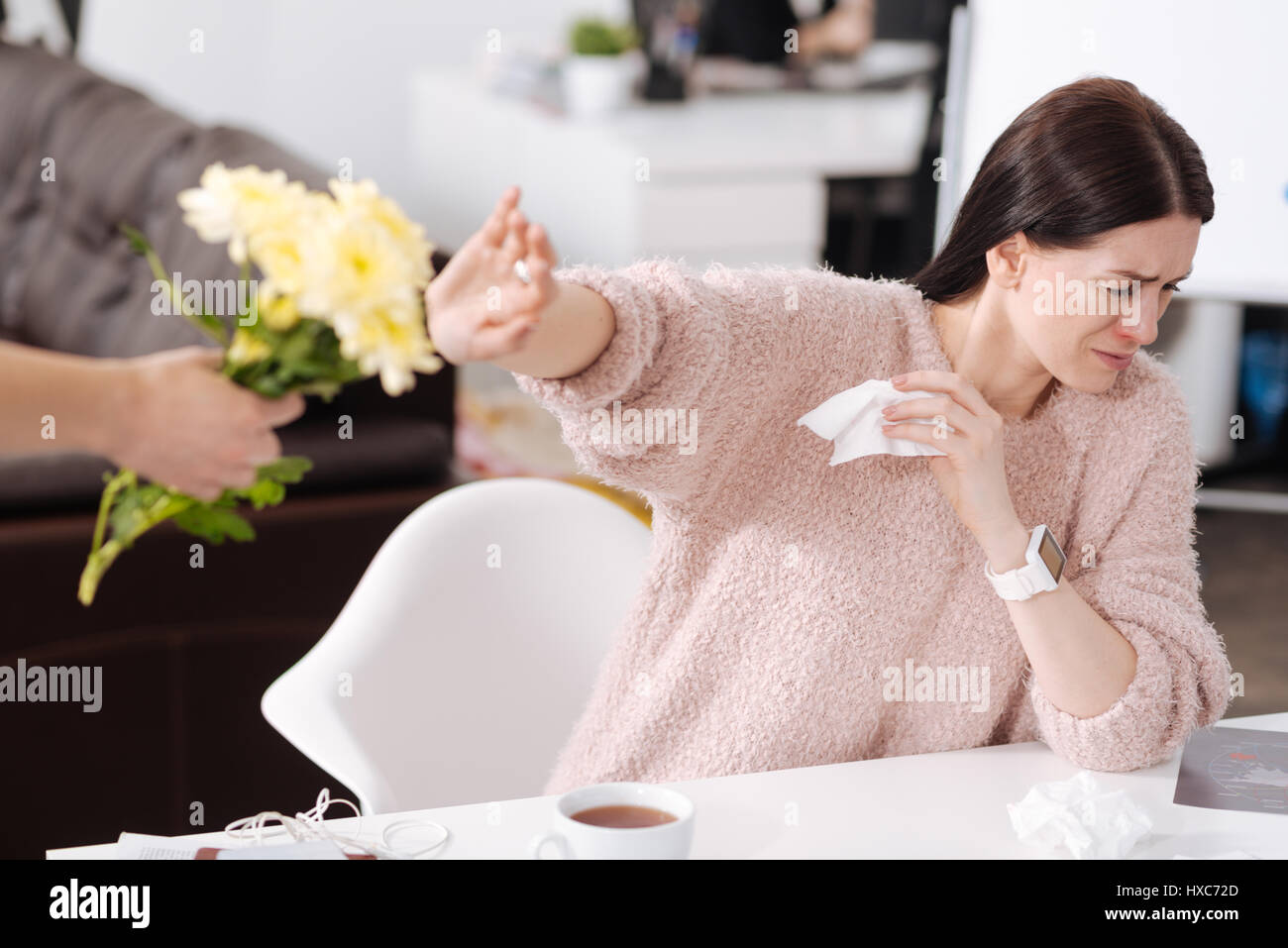 Scared girl being afraid of plants Stock Photo - Alamy