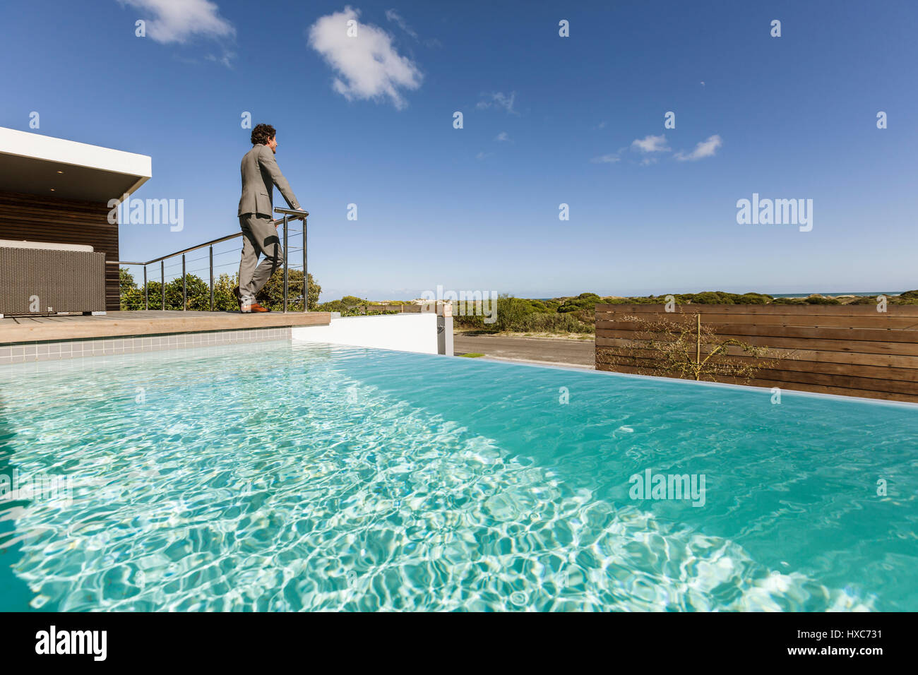 Businessman swimming pool hi-res stock photography and images - Alamy