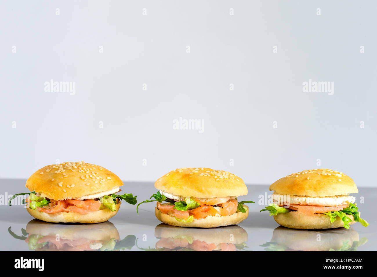 puff burger with smoked salmon in line Stock Photo - Alamy