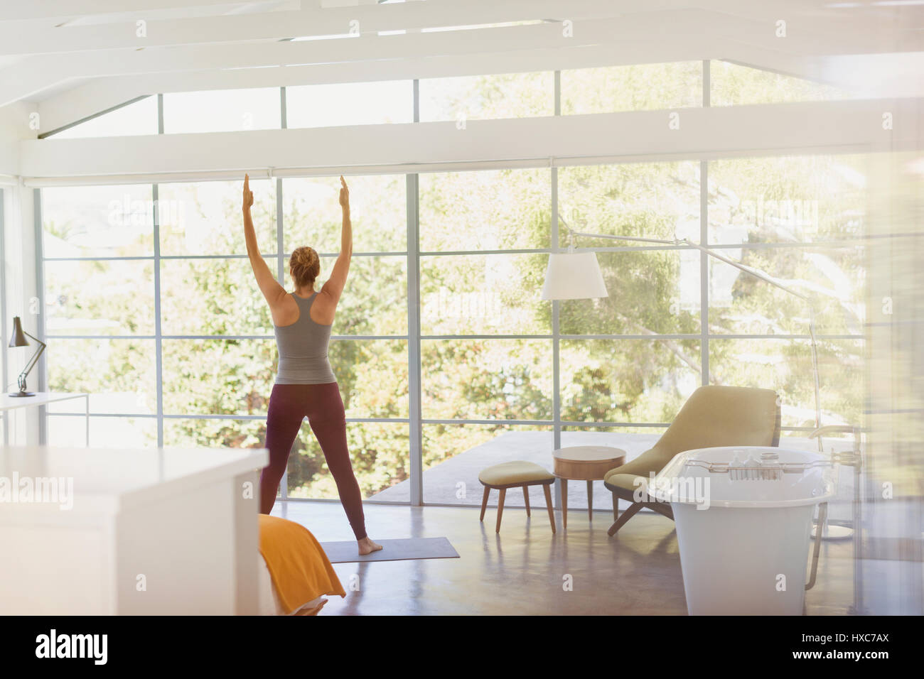 Woman luxury hotel bedroom hi-res stock photography and images - Alamy
