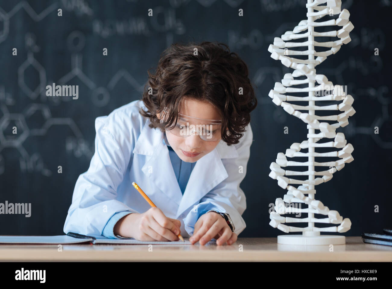 Little intelligent researcher studying science in the laboratory Stock ...