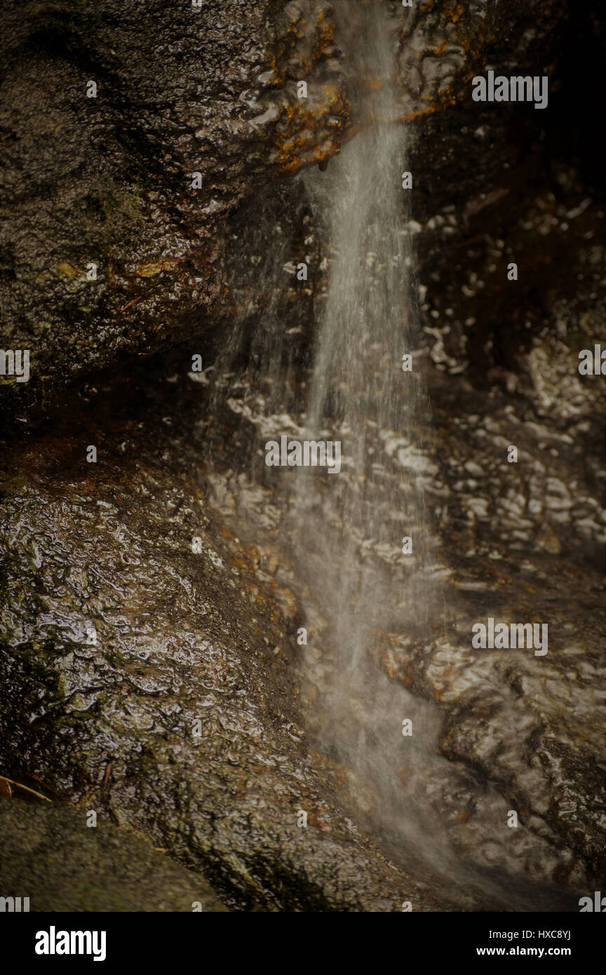 Small waterfall over the rocks Stock Photo - Alamy