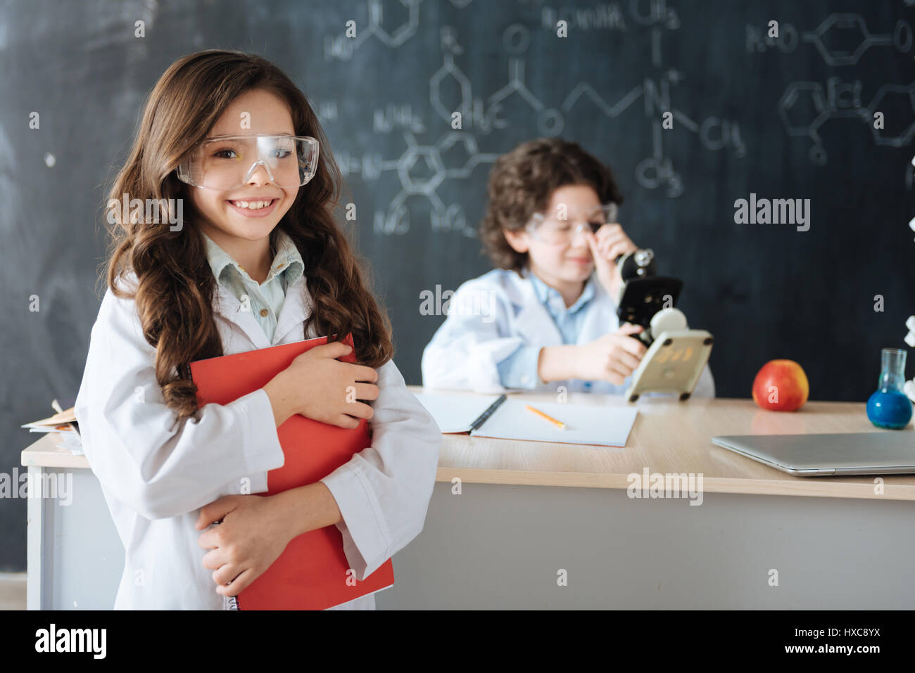 Representing our microbiology project. Smiling talented capable girl ...