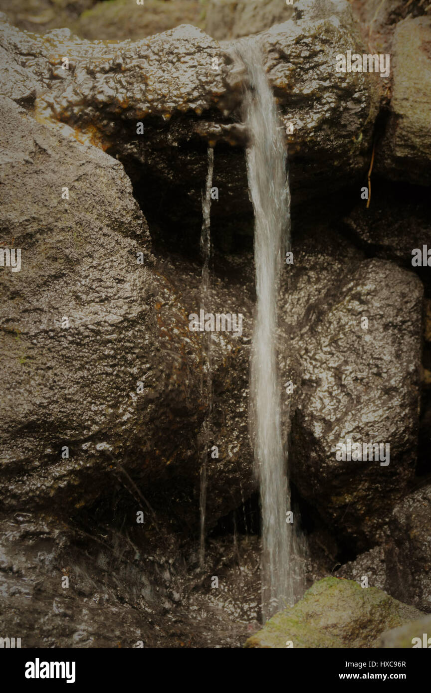 Small waterfall over the rocks Stock Photo - Alamy