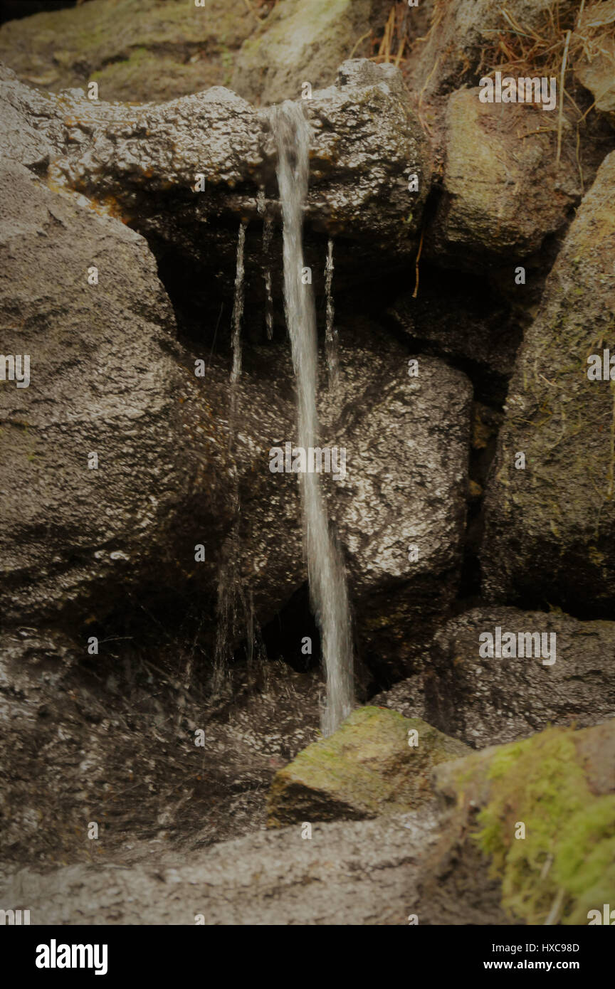 Small waterfall over the rocks Stock Photo - Alamy