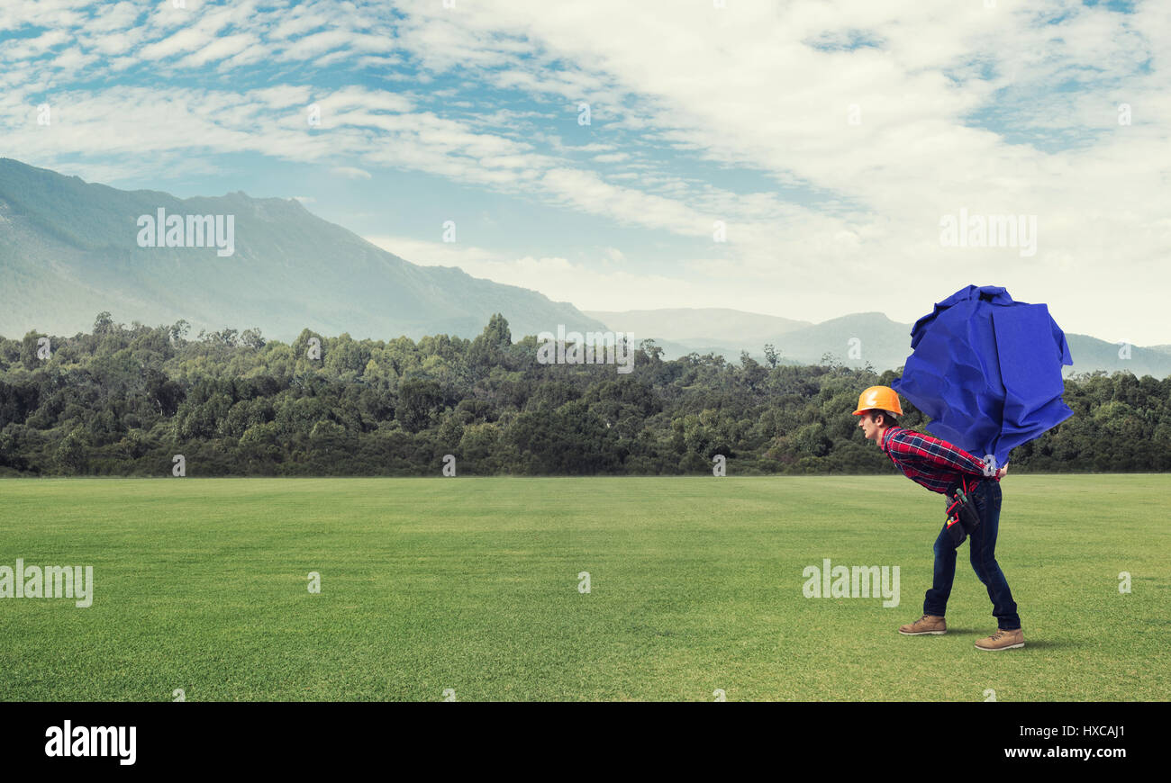 Engineer man carry load Stock Photo - Alamy
