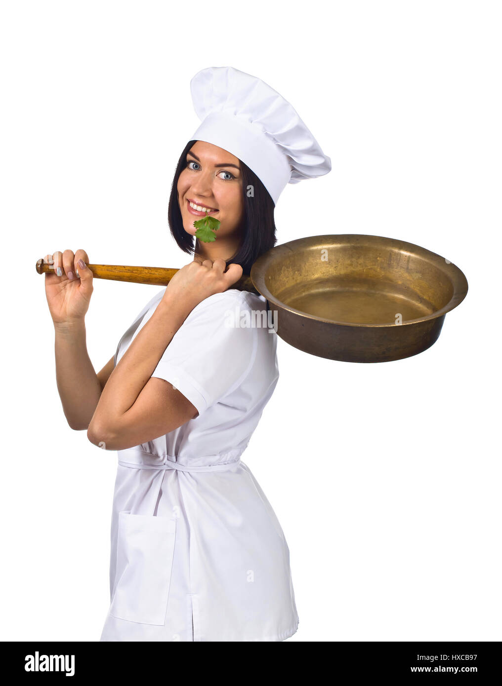 young woman in chef uniform with pan isolated on white background Stock ...