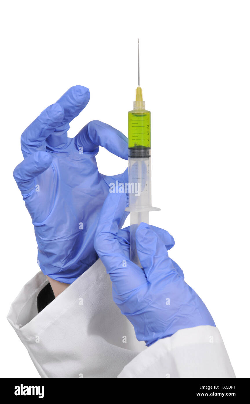 A medical doctor preparing an injection in a syringe Stock Photo - Alamy