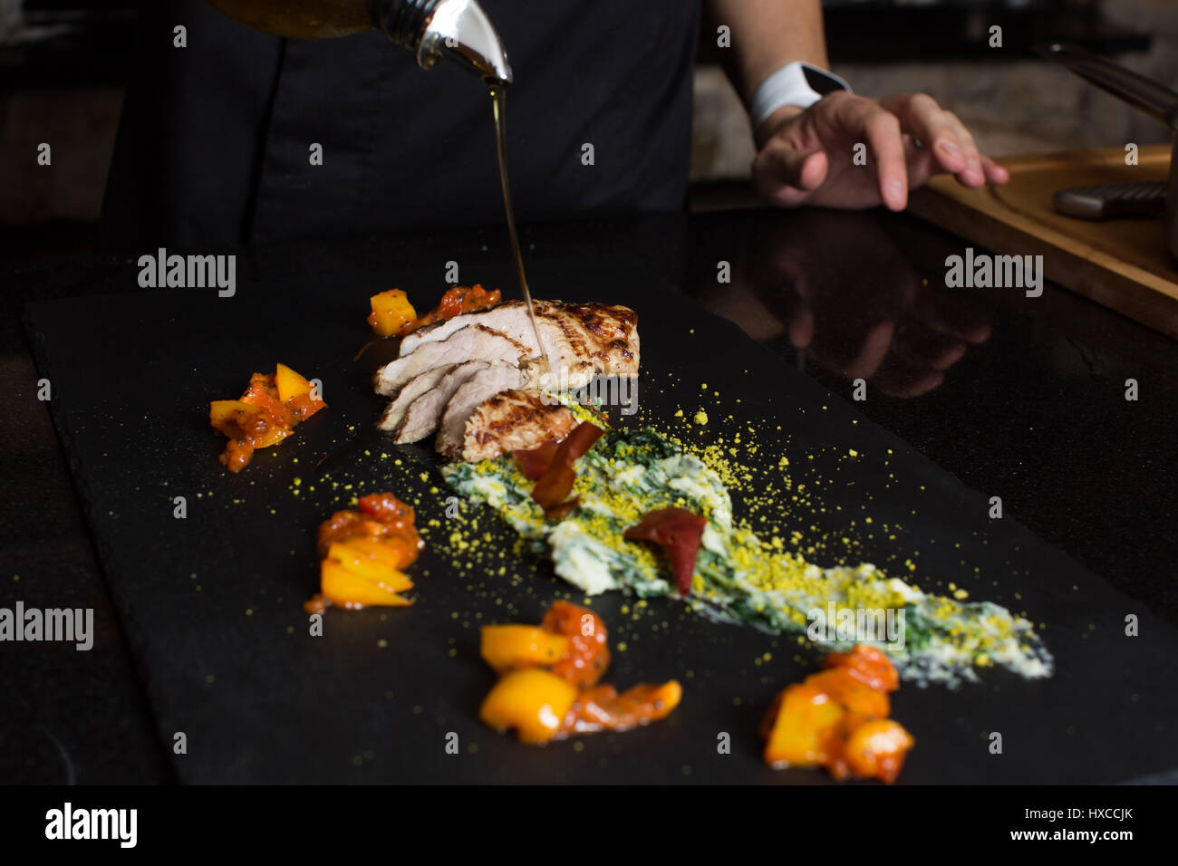 Chef preparing food dinner hi-res stock photography and images - Alamy