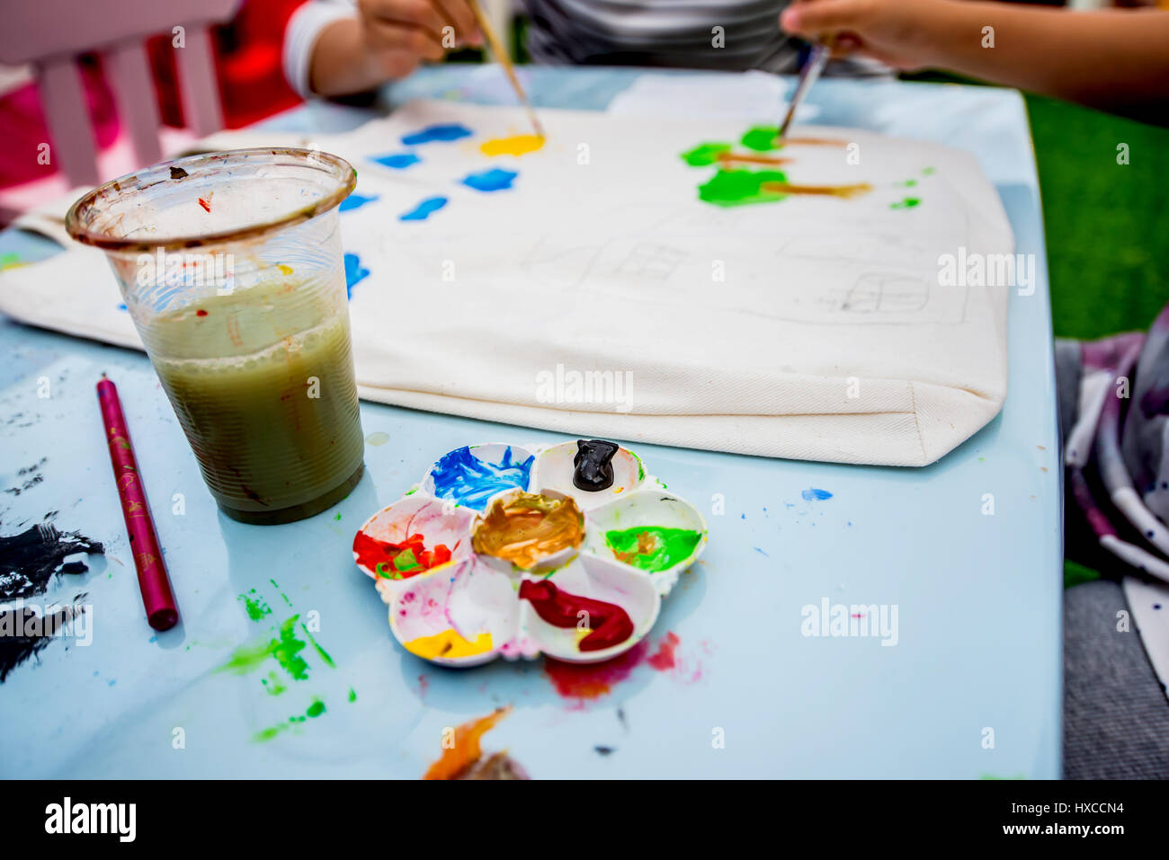 Education, Mixing Water Colors in a painting Class Stock Photo - Alamy
