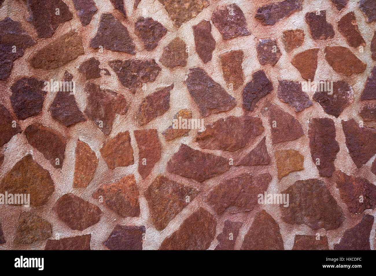Masonry stone wall with red limestones and white mortar Stock Photo - Alamy