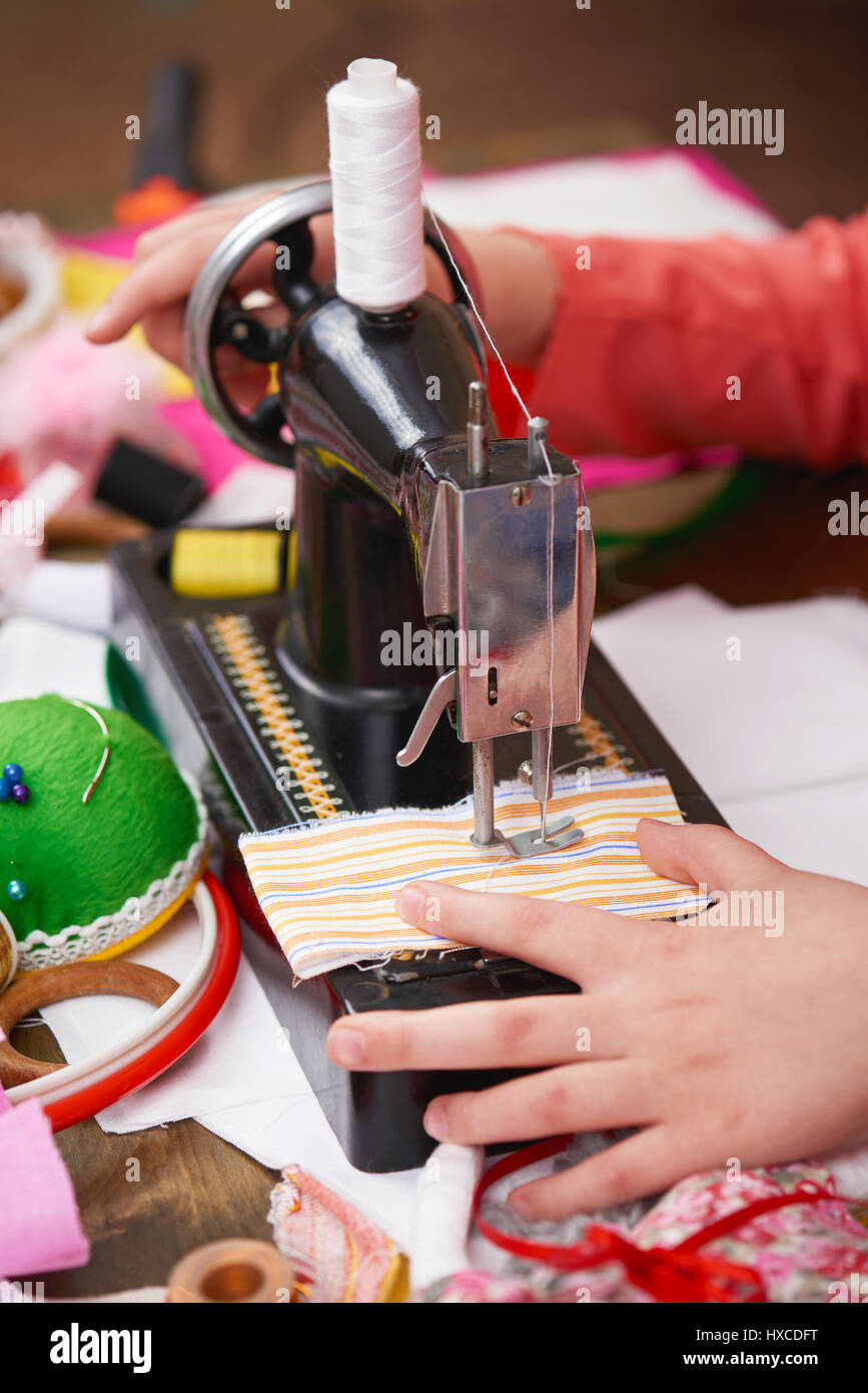 mother teaching daughter girl sew, job training, handmade and ...