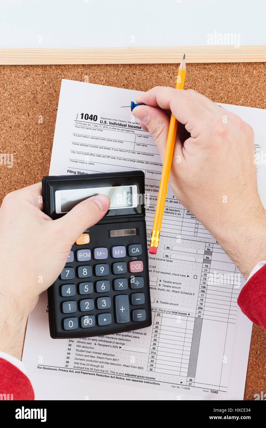 Time to fill individual income tax return form Stock Photo - Alamy