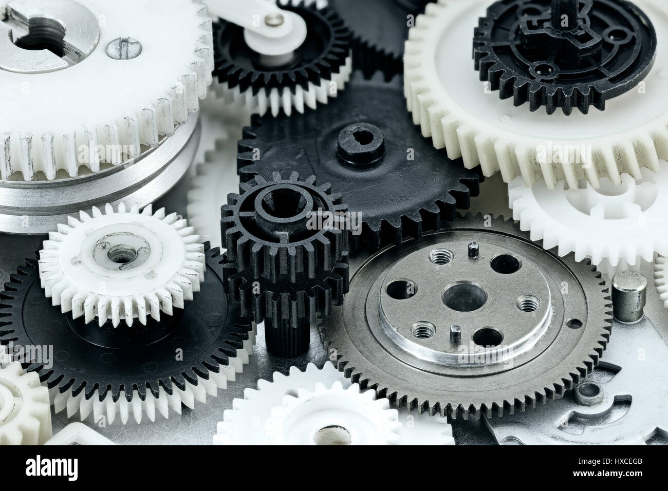 set of different metal and plastic cogwheel. industrial background ...