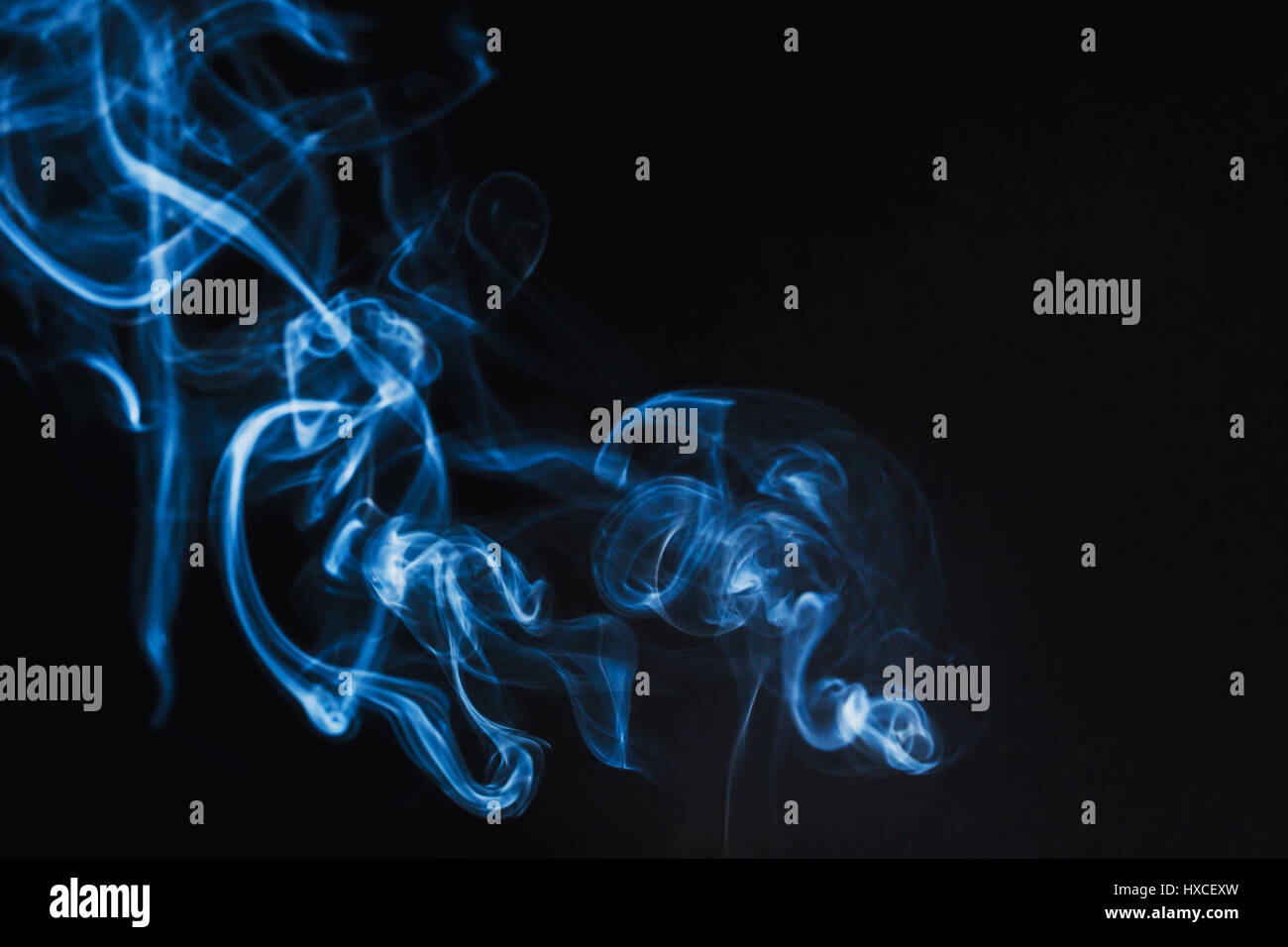 Abstract Blue Smoke on black background Stock Photo - Alamy
