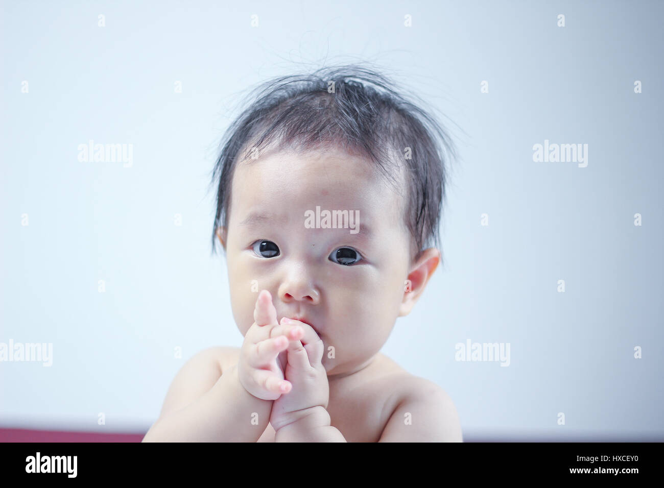 Female sucking finger hi-res stock photography and images - Alamy