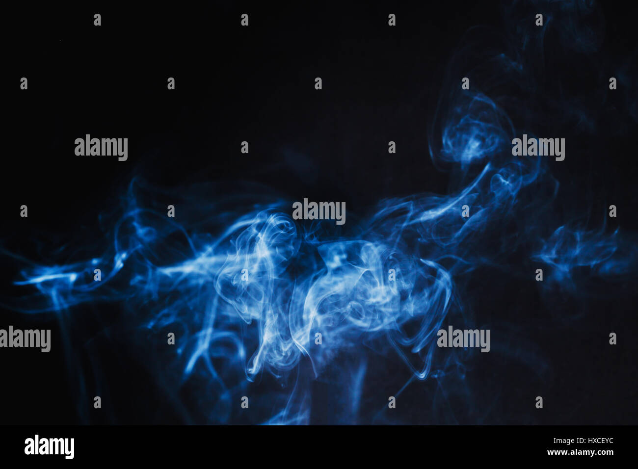Abstract Blue Smoke on black background Stock Photo - Alamy
