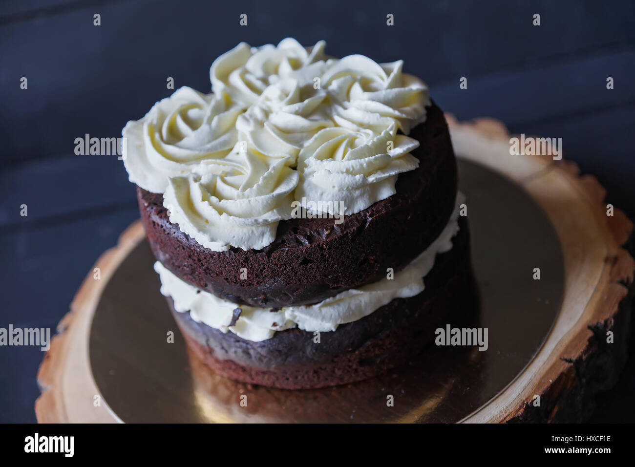 Beautiful biscuit cake with white cream Stock Photo - Alamy