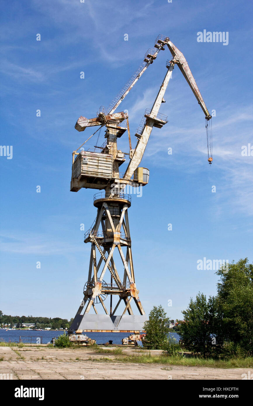 Old load crane in the harbour basin in Rostock, Age-duty crane At ...