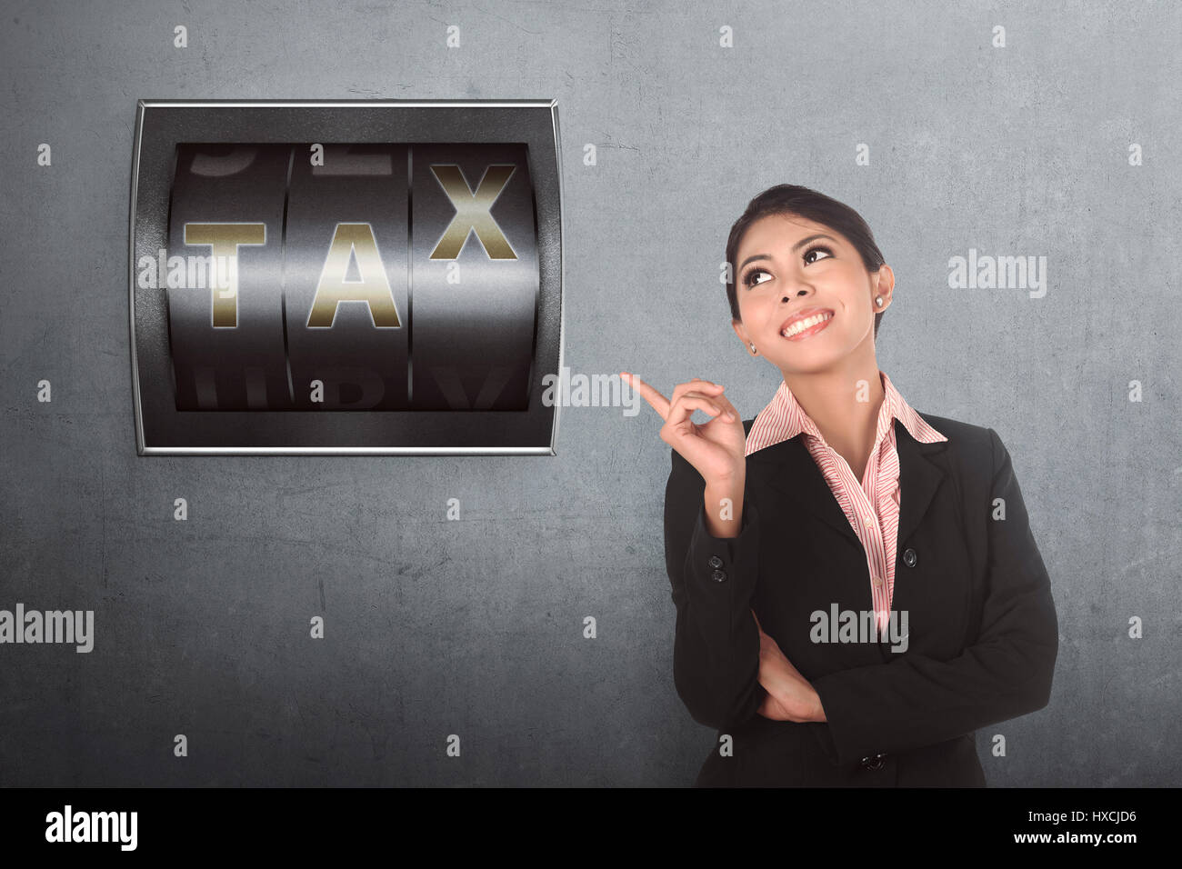 Beautiful asian business woman pointing counter digit with tax sign on ...