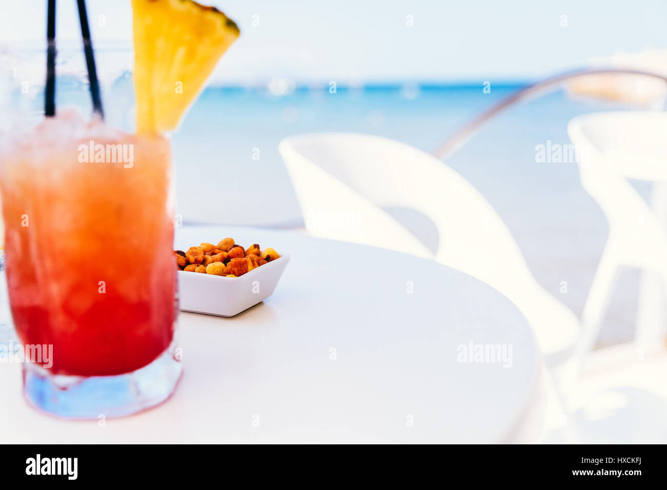 Fresh Red And Orange Cocktail Glass In Summer With Ocean Background ...