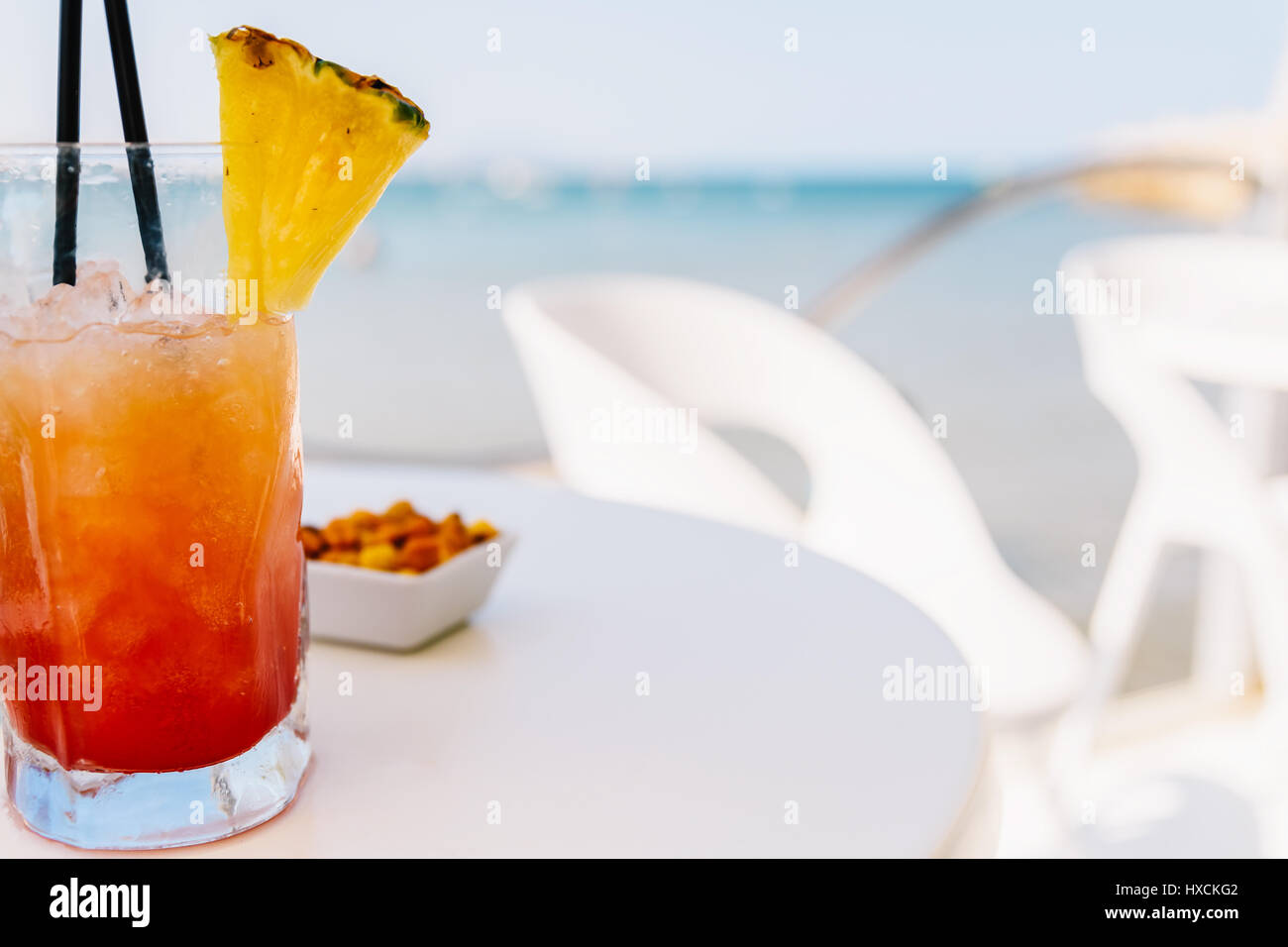 Fresh Red And Orange Cocktail Glass In Summer With Ocean Background ...