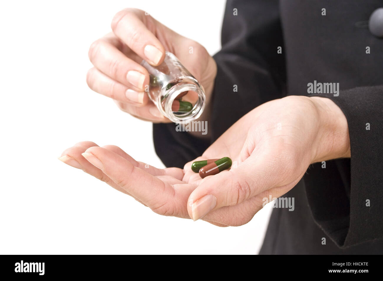 Hand with tablets, Hand mit Tabletten Stock Photo - Alamy