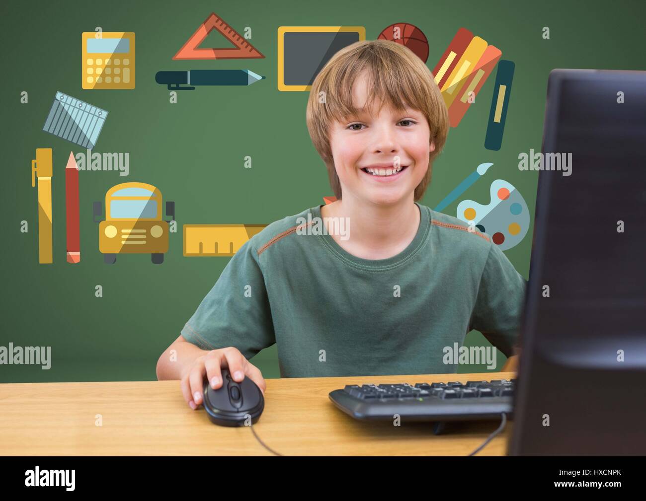 Digital composite of Young boy on computer with education graphic ...
