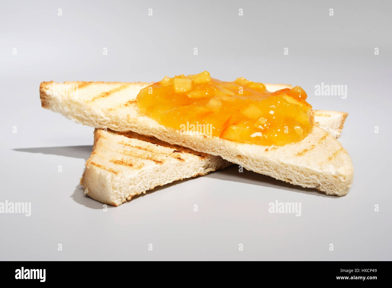 Toast bread with jam, Toastbrot mit Marmelade Stock Photo - Alamy