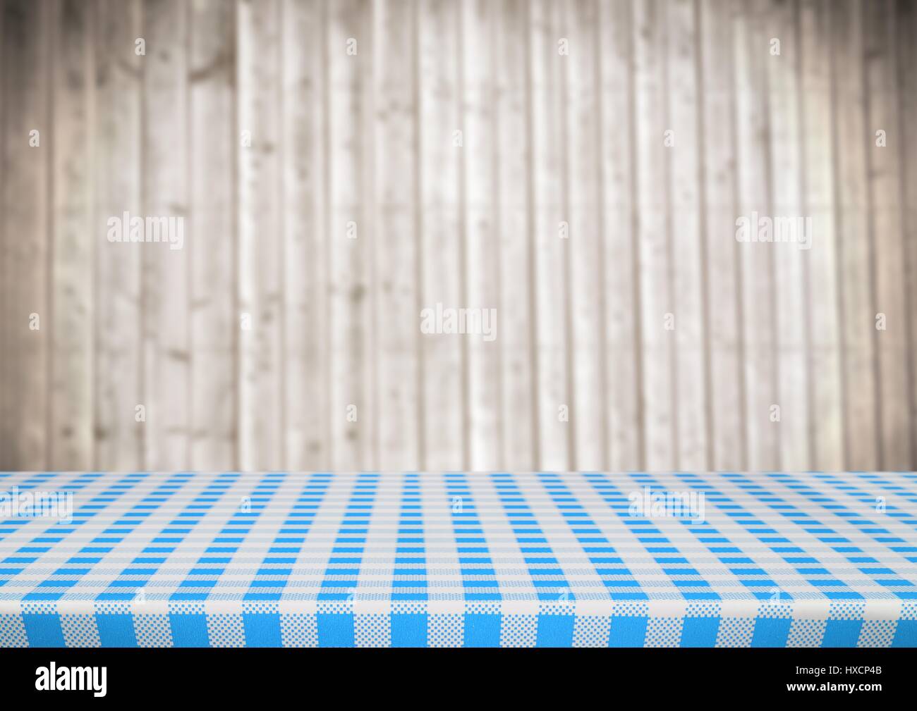 Digital composite of Picnic table against blurry wood panel Stock Photo ...