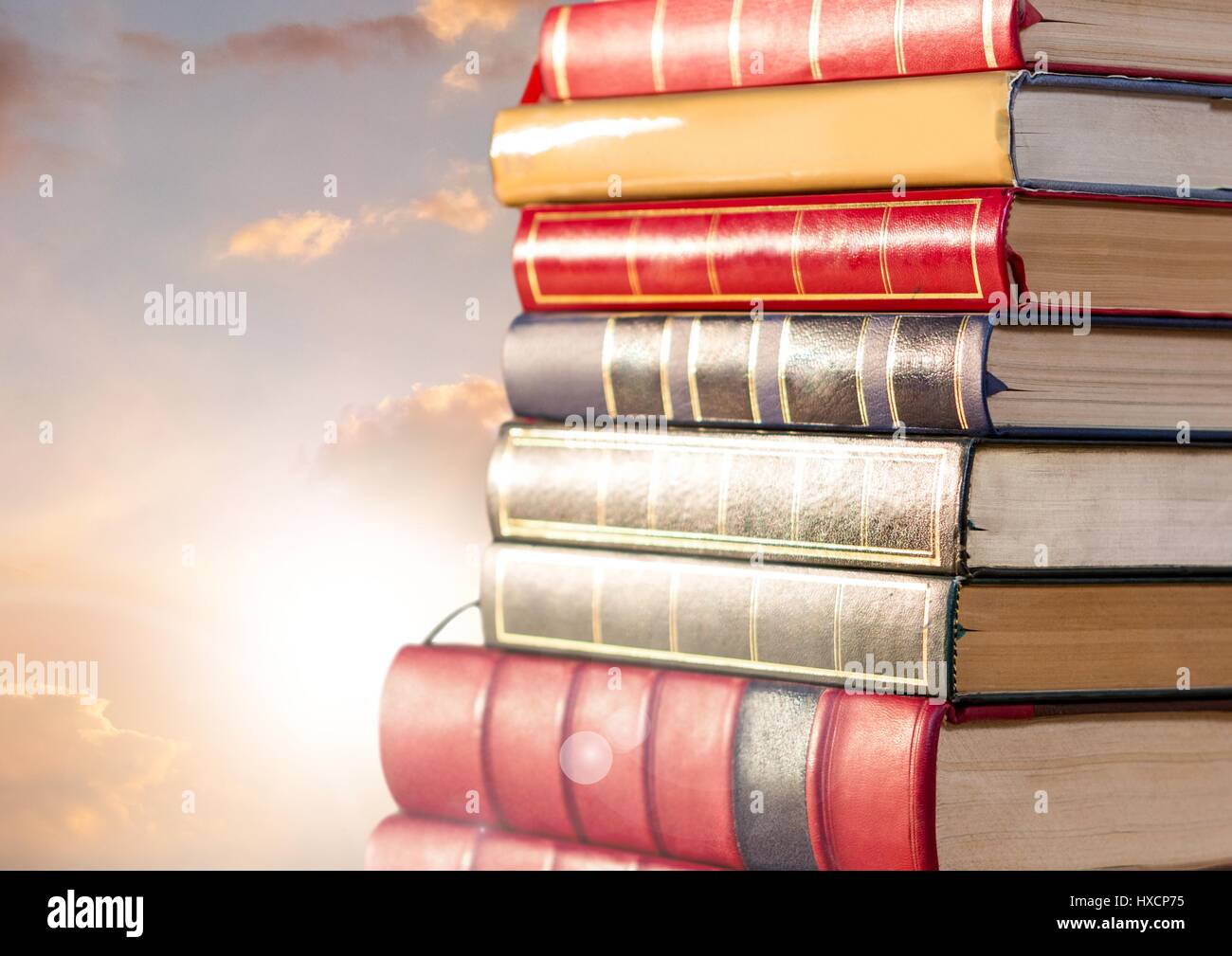 Stack books beautiful clouds hi-res stock photography and images - Alamy