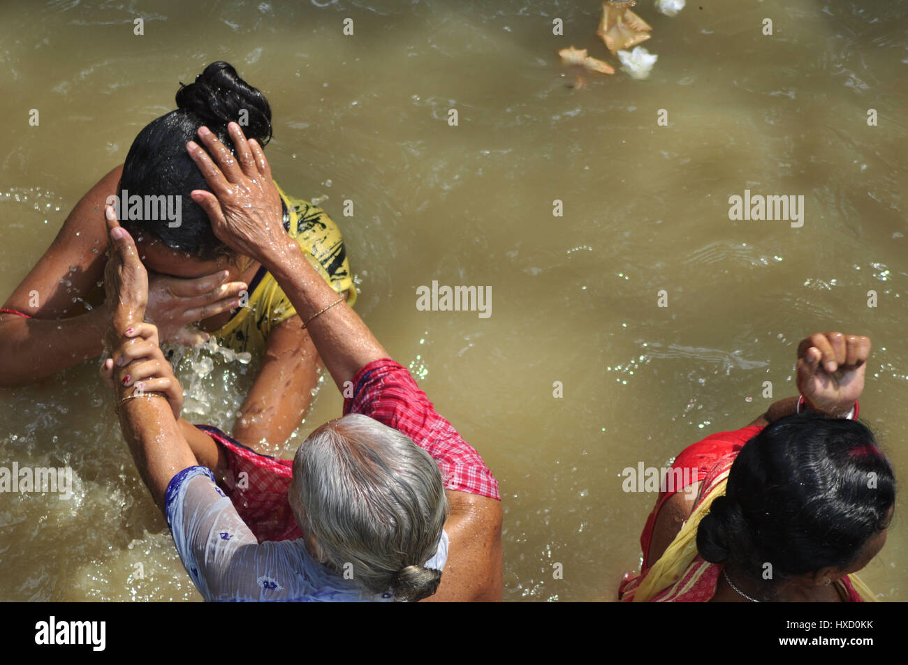 Indian woman taking bath india hi-res stock photography and images - Alamy