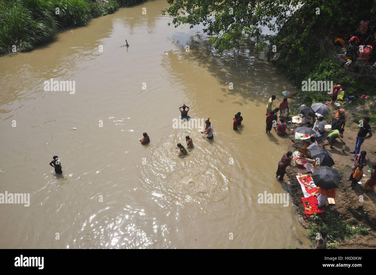 Indian woman taking bath india hi-res stock photography and images - Alamy