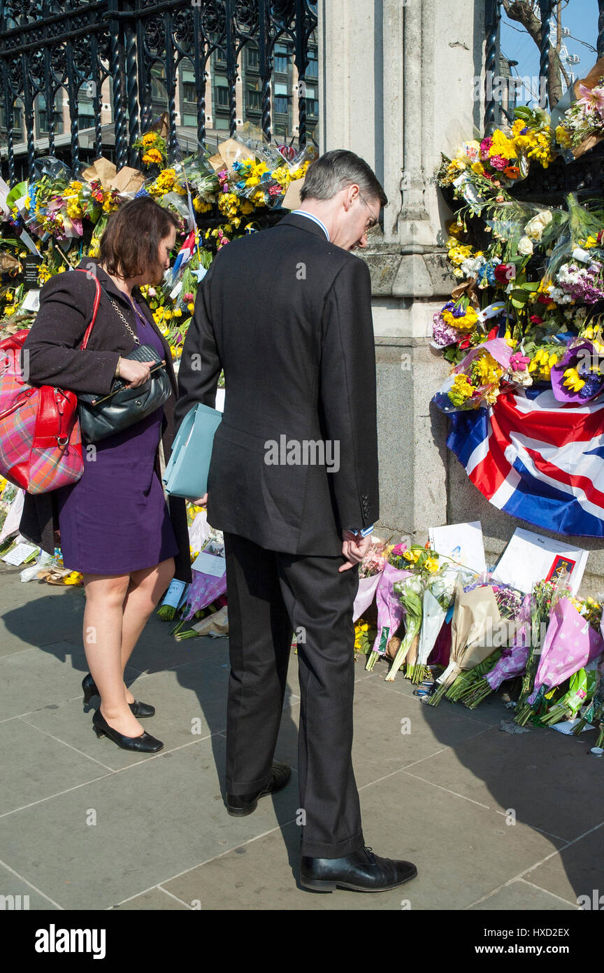 London, UK. 27th Mar, 2017. Jacob Rees-Mogg MP looks at the tributes ...