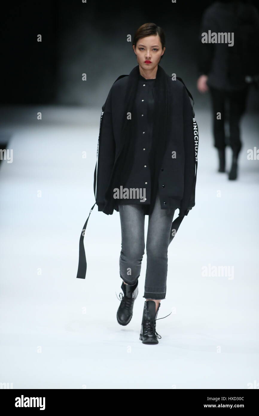 Beijing, China. 27th Mar, 2017. A model presents a creation of Chinese ...