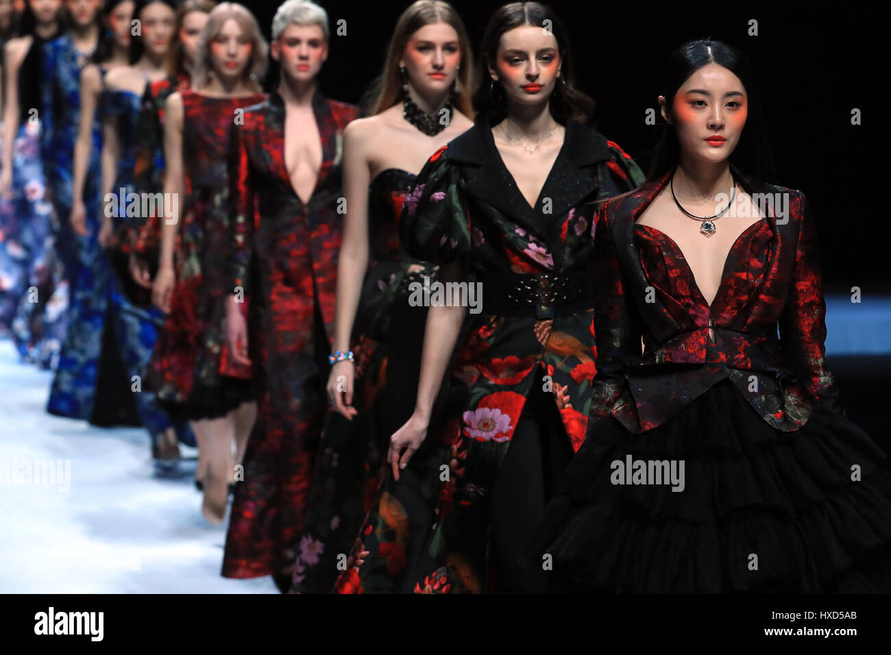 Beijing, China. 28th Mar, 2017. Models present creations by Yang Shan ...