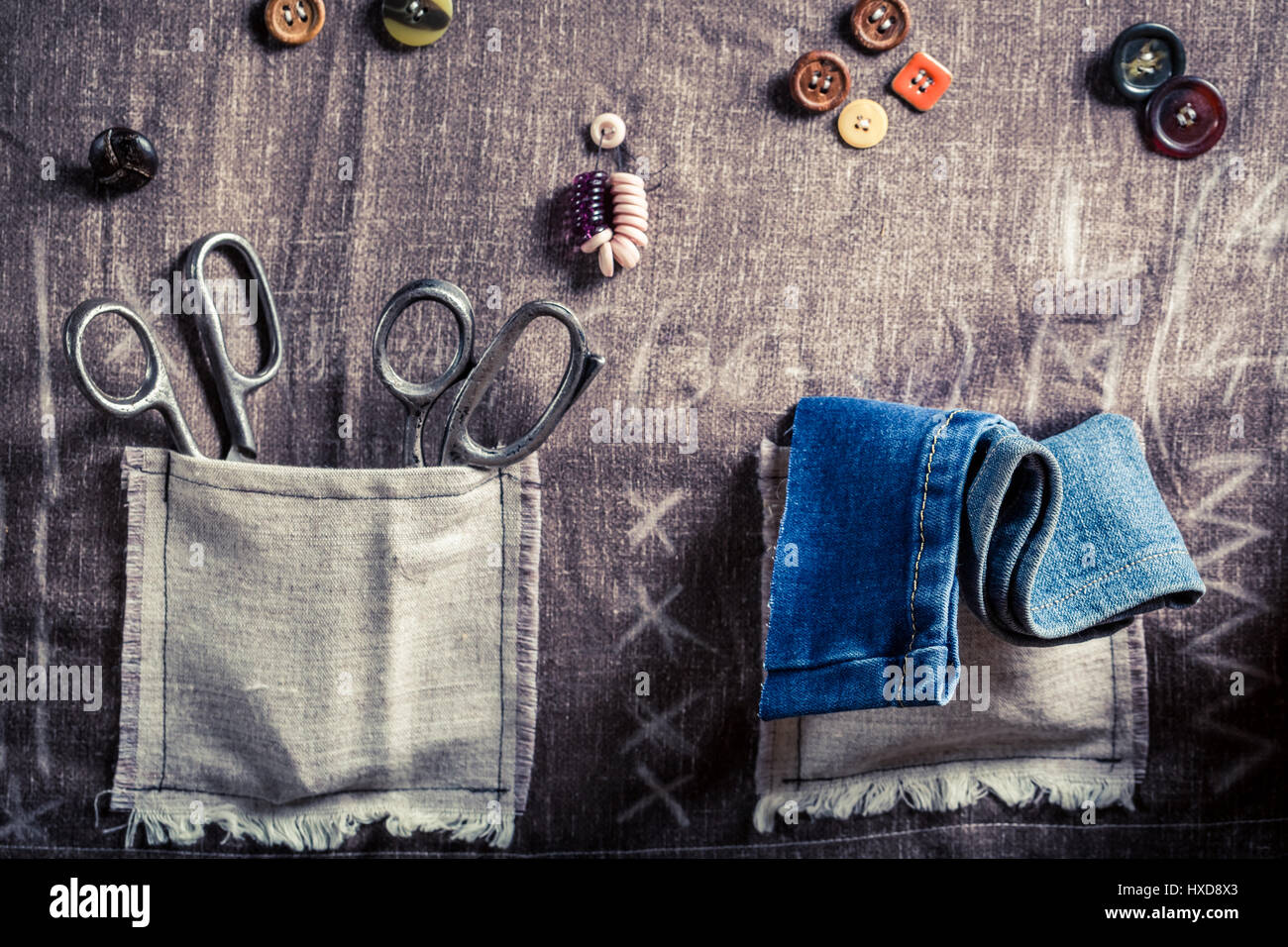 Handmade sewing mat made of needles, threads and buttons in tailor ...