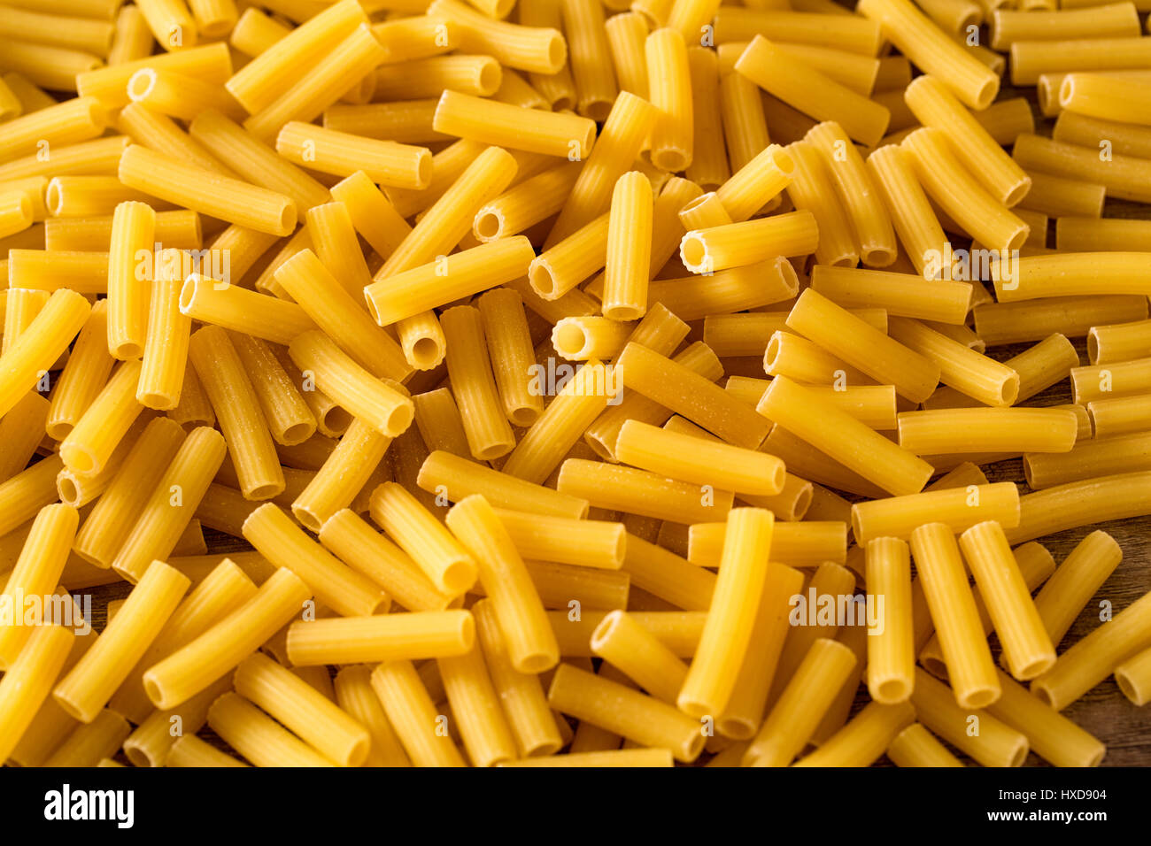 Macaroni Pasta raw close up background Stock Photo - Alamy