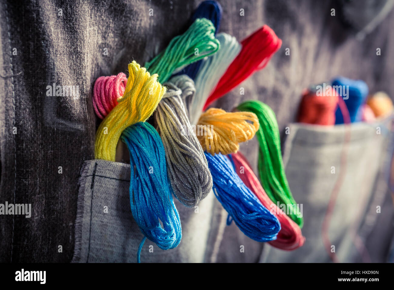 Closeup of colored threads in the mat tailor Stock Photo - Alamy