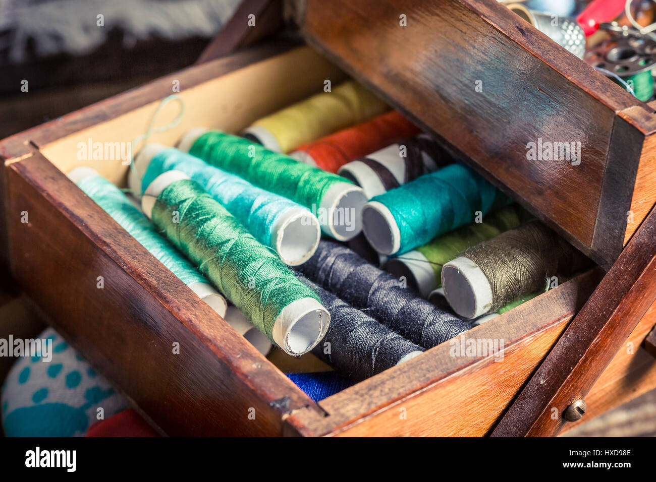 Vintage tailor's wooden box with threads, needles and buttons Stock ...