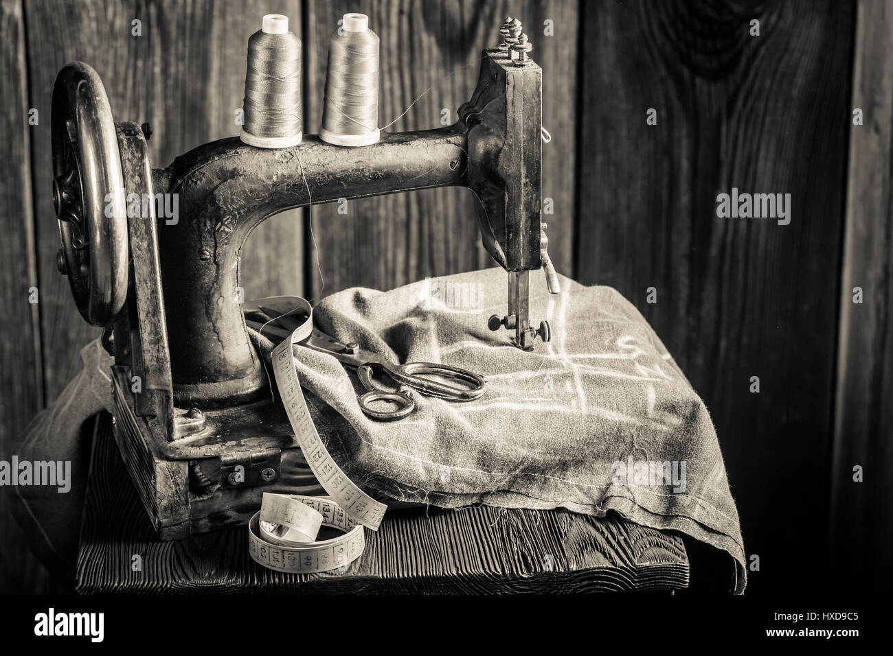 Sewing machine with scissors, cloth and threads Stock Photo - Alamy