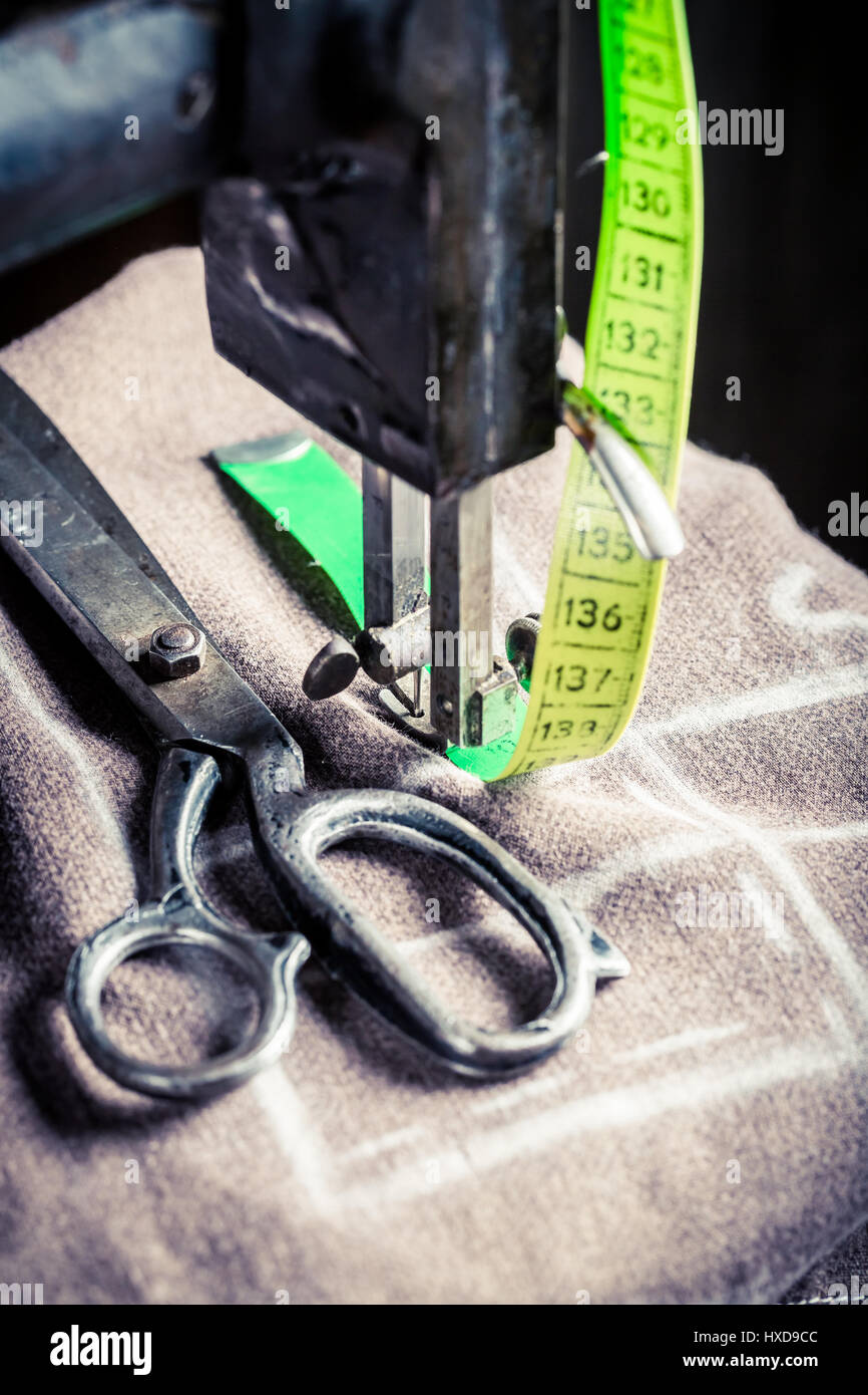 Sewing machine with needle, threads and tailor tape Stock Photo - Alamy