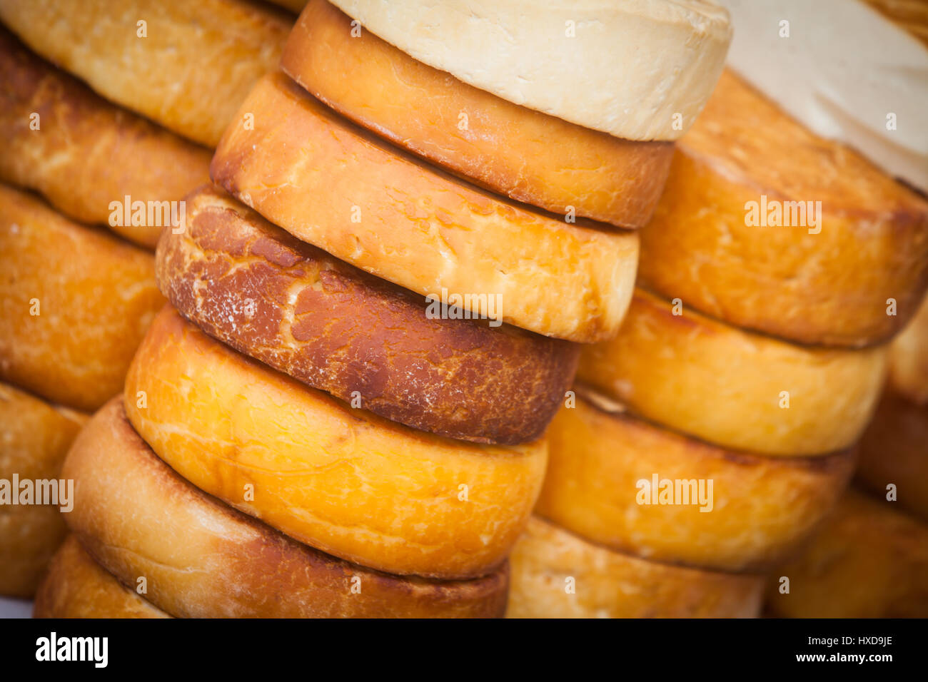 Close up shot of a pile of traditional home made round cheese Stock ...