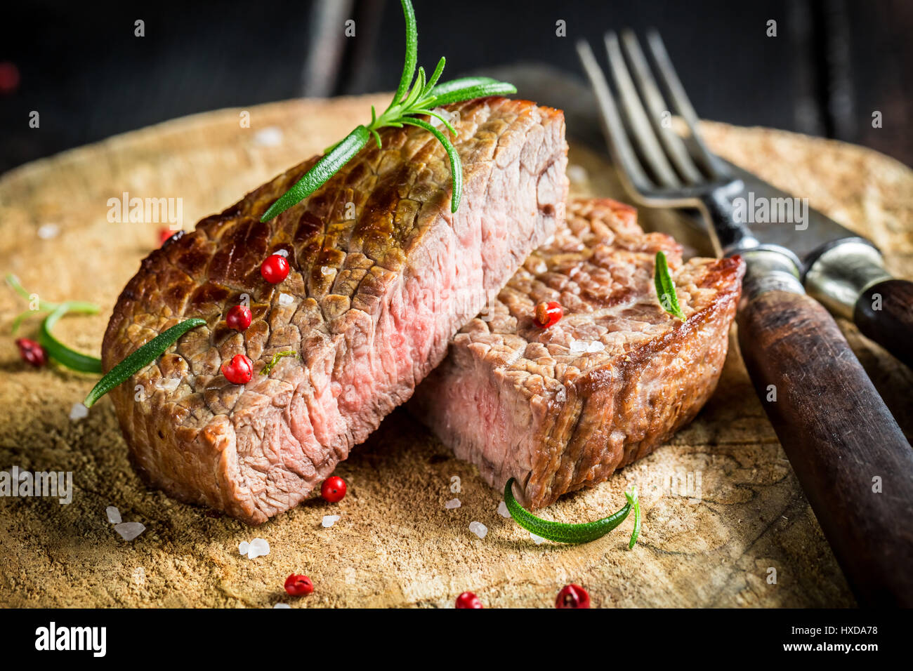 Roasted steak with herbs and spices Stock Photo - Alamy