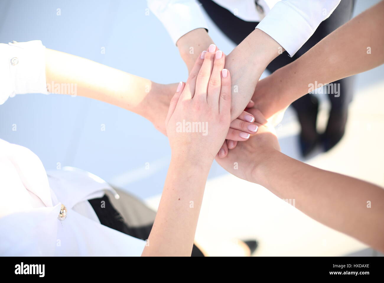 Group handshake with a lot of different hands Stock Photo - Alamy