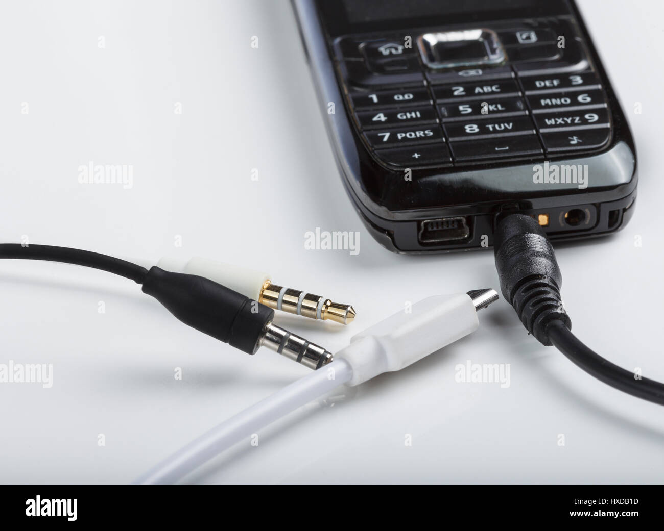 Mobile cellphone accessories, plug, earphones, connectors isolated on a ...