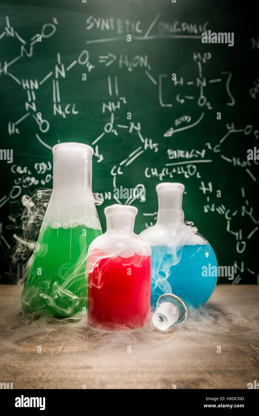 Academic laboratory with beakers and books Stock Photo - Alamy