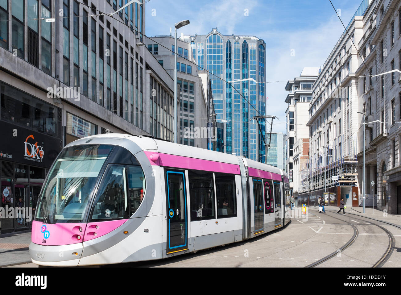 A new tram running through Birmingham City centre in Bull Street Stock ...