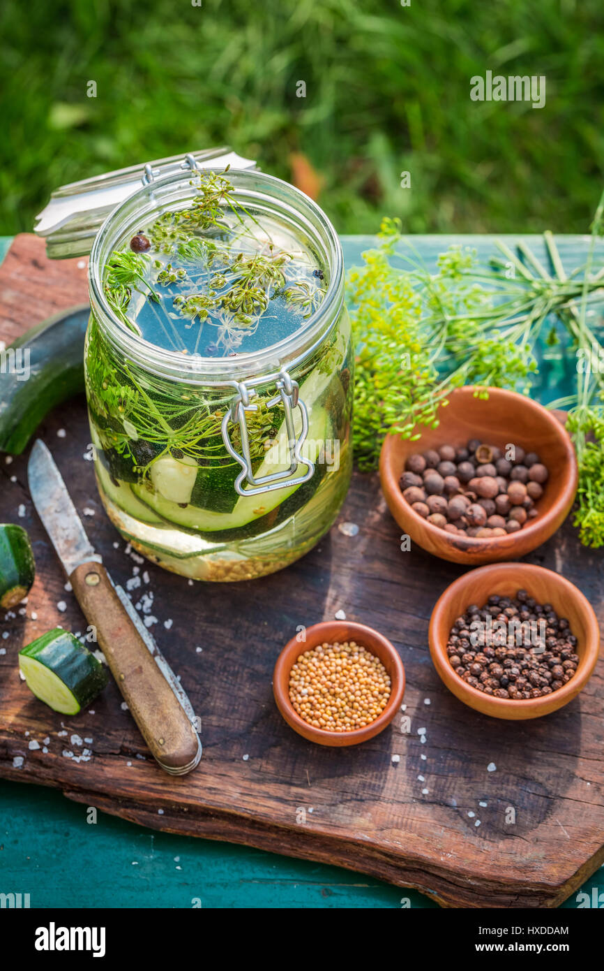Pickled courgettes with fresh ingredients Stock Photo - Alamy