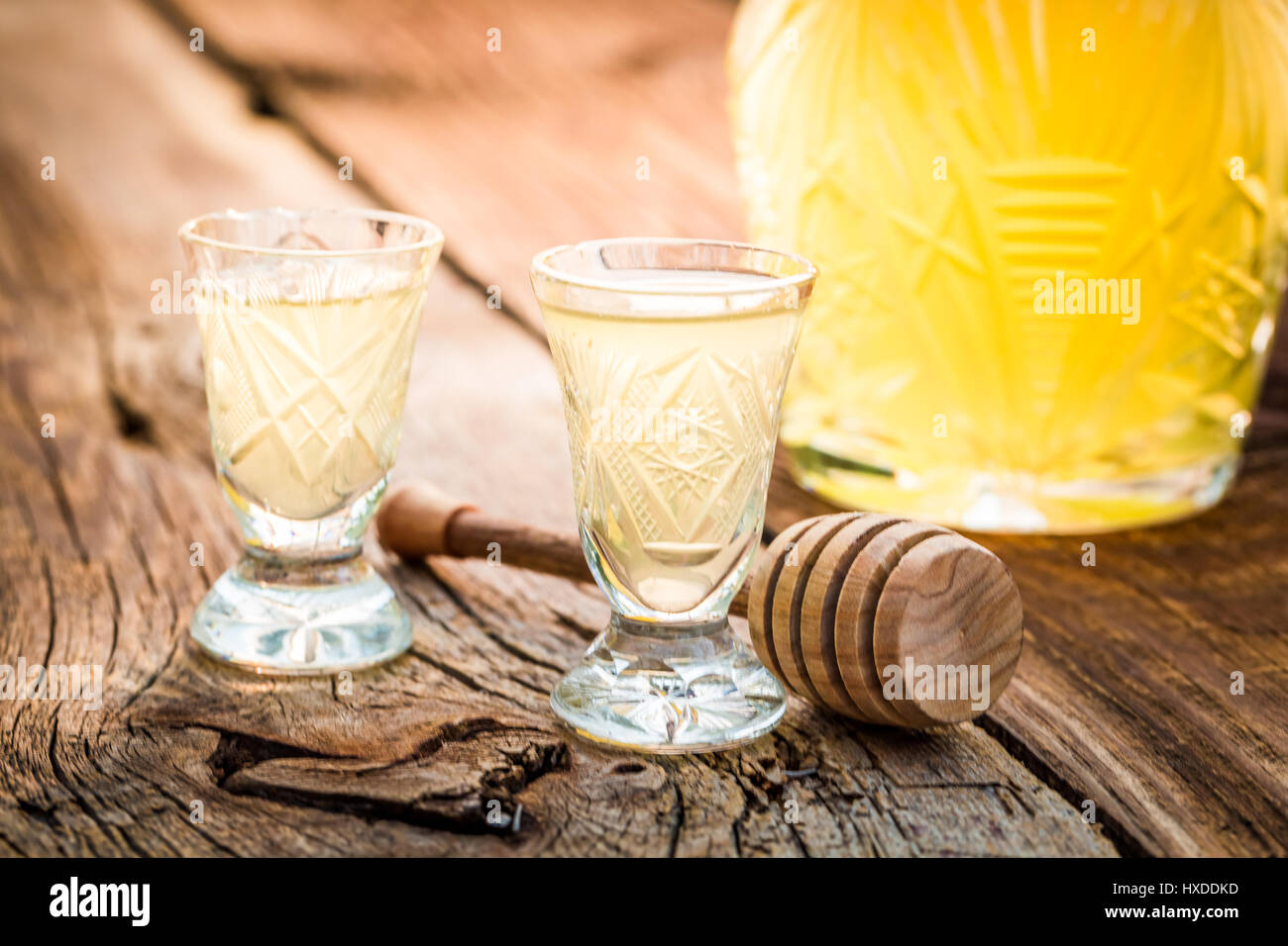 Tasty liqueur made of alcohol and honey Stock Photo - Alamy